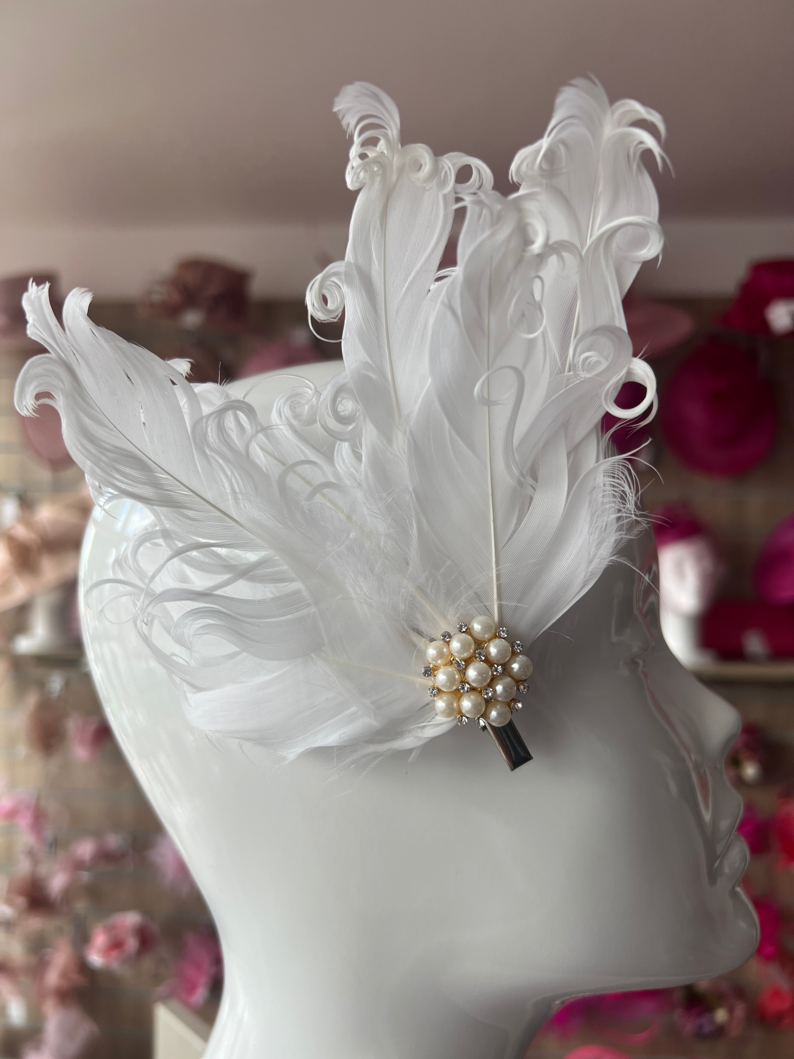 white feather clip
